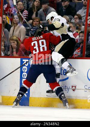 Washington Capitals defenseman Jack Hillen (38) shoots the puck in the ...