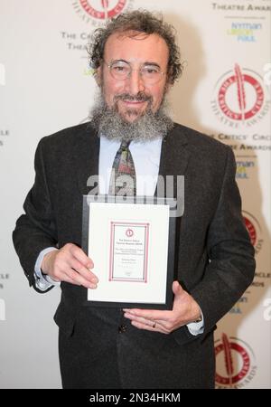 Actor Antony Sher poses for photographers after winning the best ...