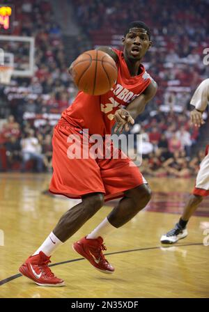New Mexico guard Deshawn Delaney tries to get a shot off against San ...