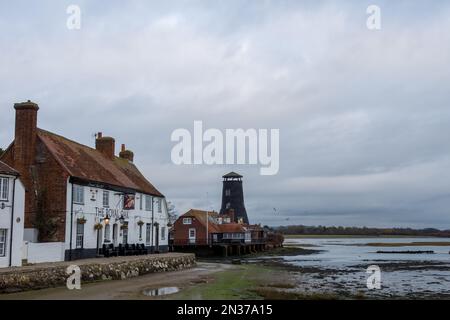 The Royal Oak public house and Langstone Mill on the shoreline at the ...