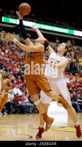 Texas guard Brady Sanders, left, takes control of the ball against ...