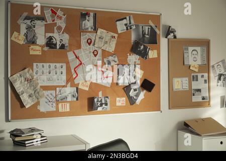 Detective office interior with evidence board on wall Stock Photo - Alamy