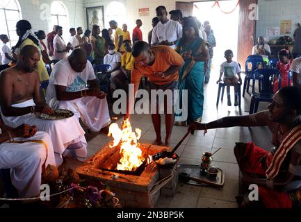 DURBAN SOUTH AFRICA Hindu devotees get thier containers blessed in the ...