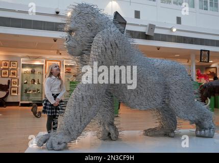Turner prize nominated artist David Mach sits on his partially ...