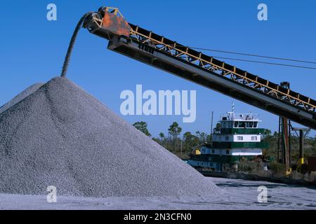 Tyndall welcomes one of many barge deliveries of concrete aggregate ...