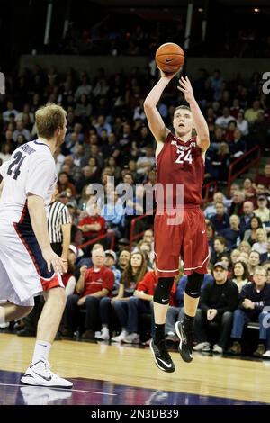 Washington State's Josh Hawkinson, right, shoots against Arizona's ...