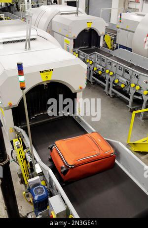 Security screening of carry-on luggage prior to the gates entrance ...