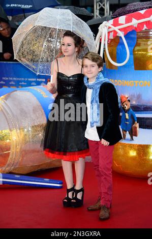 Madeleine Harris and Samuel Joslin pose for photographers upon arrival ...