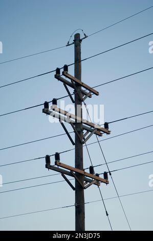 Overhead low voltage electrical power line on wooden pole. Scout Scar ...