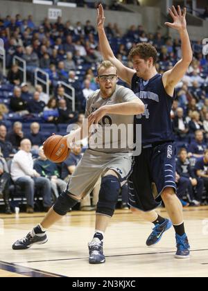 Xavier center Matt Stainbrook (40) drives against Providence forward ...