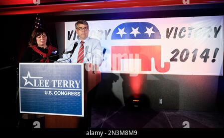 Republican House of Representatives candidate Lee Terry, flanked by his wife Robin, address ...