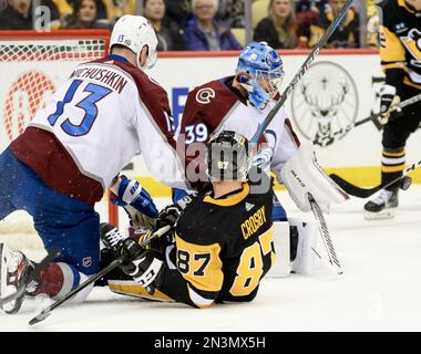 Colorado Avalanche right wing Valeri Nichushkin, top right, puts a shot ...
