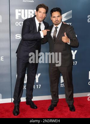 Actors Michael Pena and Jon Bernthal attend the movie premiere of Fury ...