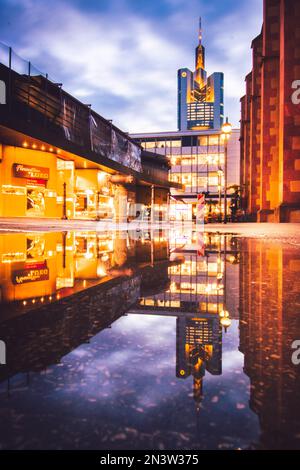 Reflection of the Commerzbank skyscraper or Commerzbank Tower at rain ...
