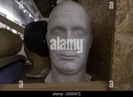 Modern art detail, realistic sculpted faces Stock Photo - Alamy