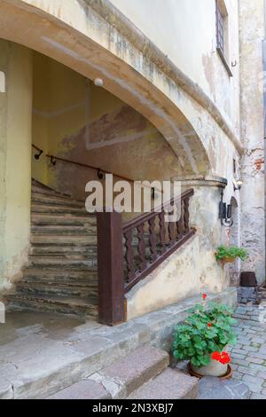 Autumn in medieval convent yard in old European town. Jaunpils, Latvia ...