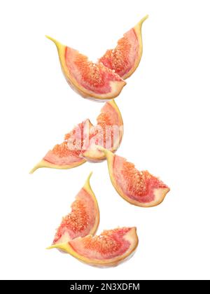 Cut and whole figs falling on white background Stock Photo - Alamy