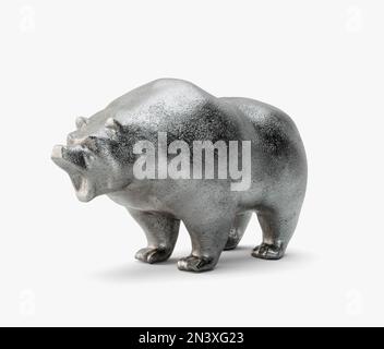 A token statuette depicting a silver bear on an isolated dark ...