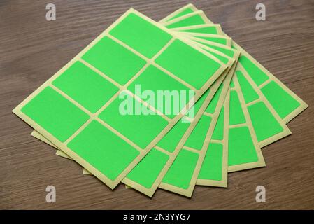 A set of green rectangular paper sticker label isolated on white ...