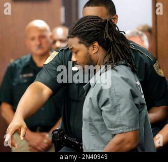 Jesse Leroy Matthew Jr. is escorted into a courtroom for an appearance ...