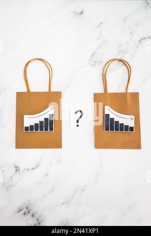 when will inflation go down. shopping bags with graph showing prices ...