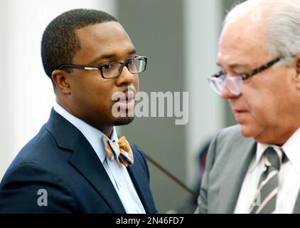 Defense attorneys E. Carlos Tanner III, right, and John Colette confer ...