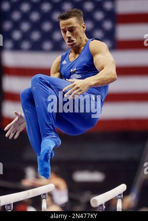 Jacob Dalton competes on the parallel bars during the U.S. men's ...