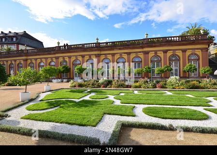 A scenic view of a backyard and the castle of Weilburg architecture ...