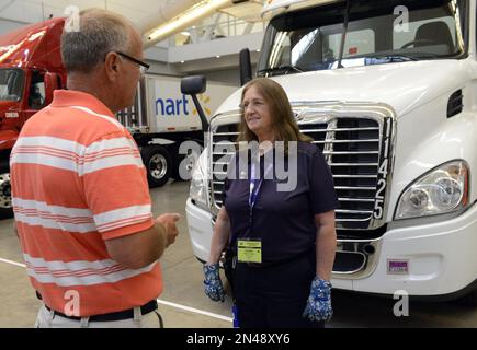 FedEx driver Debbie Conn of Ark., center, prepares to compete at the ...