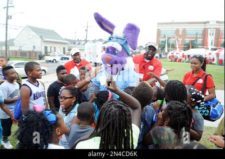 Dr. Rabbit, Colgate's mascot, helps the National Dental Association and ...