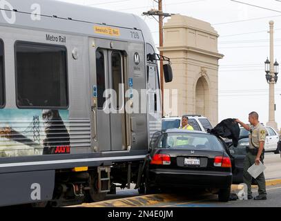Metro Rail of the Gold Line light rail transit at the Pico Aliso stop ...
