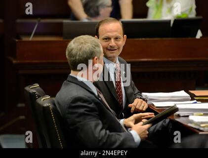 Creighton Waters, Assistant Attorney General, gestures as he argues ...