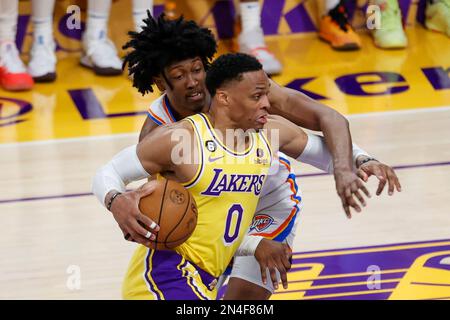 Los Angeles Lakers guard Russell Westbrook (R) drives against Oklahoma ...