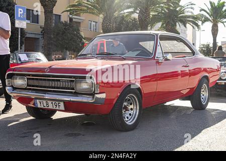 Old retro Opel vintage red car back parked on a city street Stock Photo ...