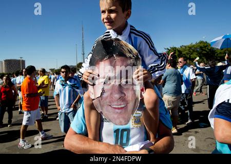 Argentina's Lionel Messi holds his face after the World Cup group C ...