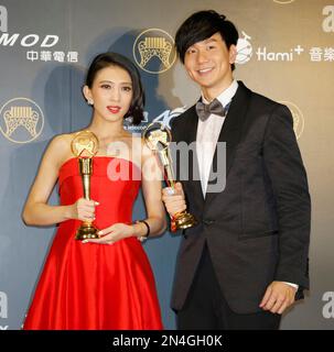 Malaysian singer Penny Tai, left, poses with her Taiwanese husband ...