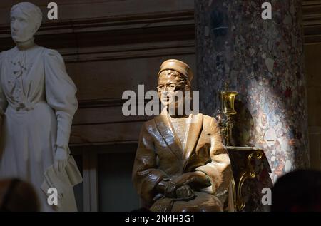A statue of civil rights activist, Rosa Parks, sitting on a bus in ...