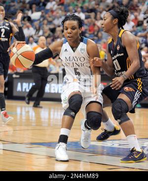 Minnesota Lynx guard Tan White (5) tries to pass the ball against Tulsa ...