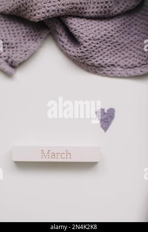 wooden cubes with the inscription March 8 on orange background. 8 march ...