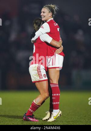 Arsenal's Steph Catley (right) celebrates scoring their side's first ...