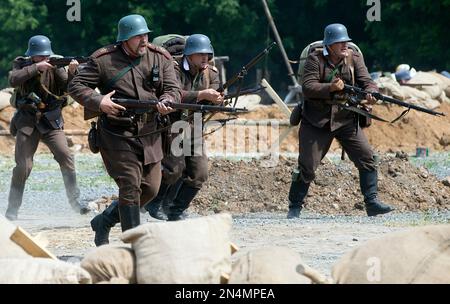 Members of historic clubs wearing WWI era uniforms take part in a ...
