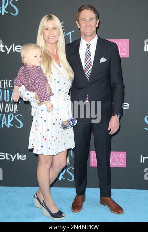 Race car driver Ryan Hunter-Reay (L) and model Beccy Gordon arrive at ...