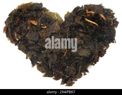 Fried moringa leaves over white background Stock Photo - Alamy