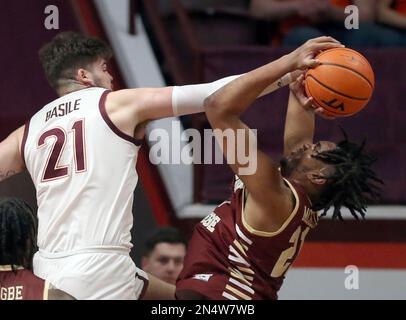 Virginia Tech's Grant Basile, left, defends as Pittsburgh's Jamarius ...