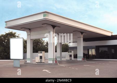 Empty billboard on modern gas station outdoors, space for design Stock ...
