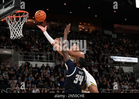 Providence forward Ed Croswell (5) and Georgetown forward Bradley ...