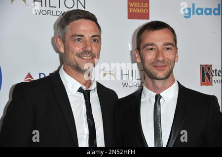 Cameron Laux, left, and Charlie Condou arrive at the 25th Annual GLAAD ...