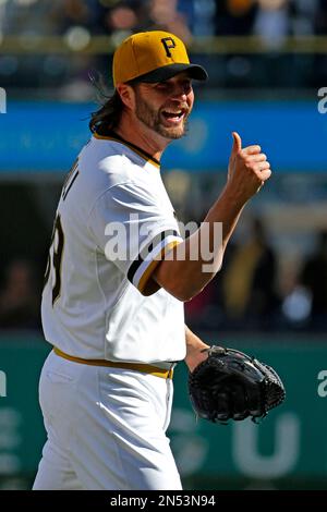 Pittsburgh Pirates closer Jason Grilli hugs first baseman Gaby Sanchez ...