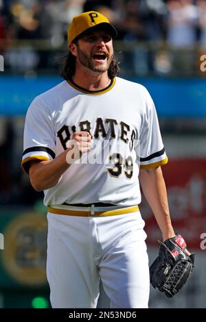 Pittsburgh Pirates closer Jason Grilli hugs first baseman Gaby Sanchez ...