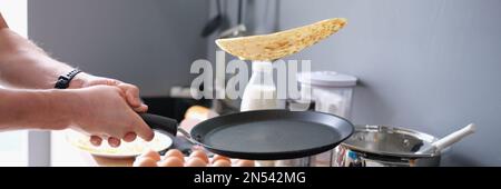 Person deftly flips the pancakes in pan Stock Photo - Alamy
